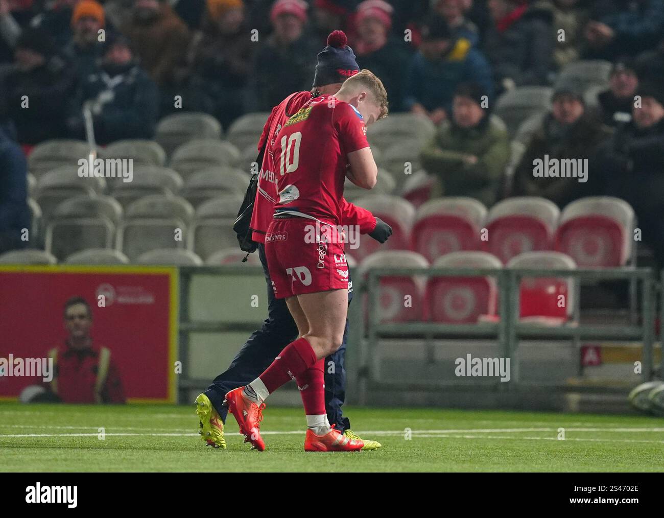 Scarlets' Sam Costelow leaves the game injured during the EPCR ...