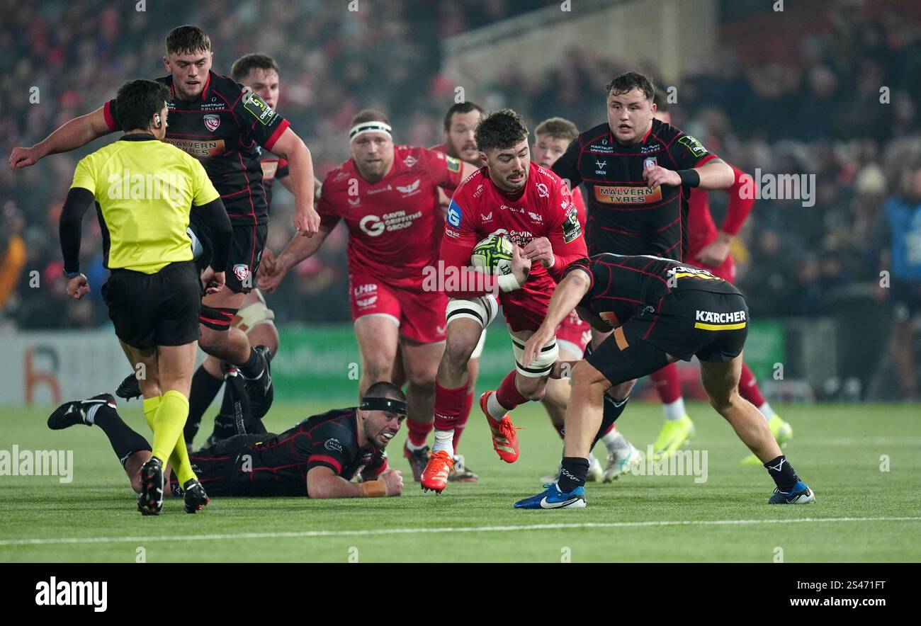 Gloucester's Chris Harris tackles Scarlets' Alex Craig during the EPCR ...