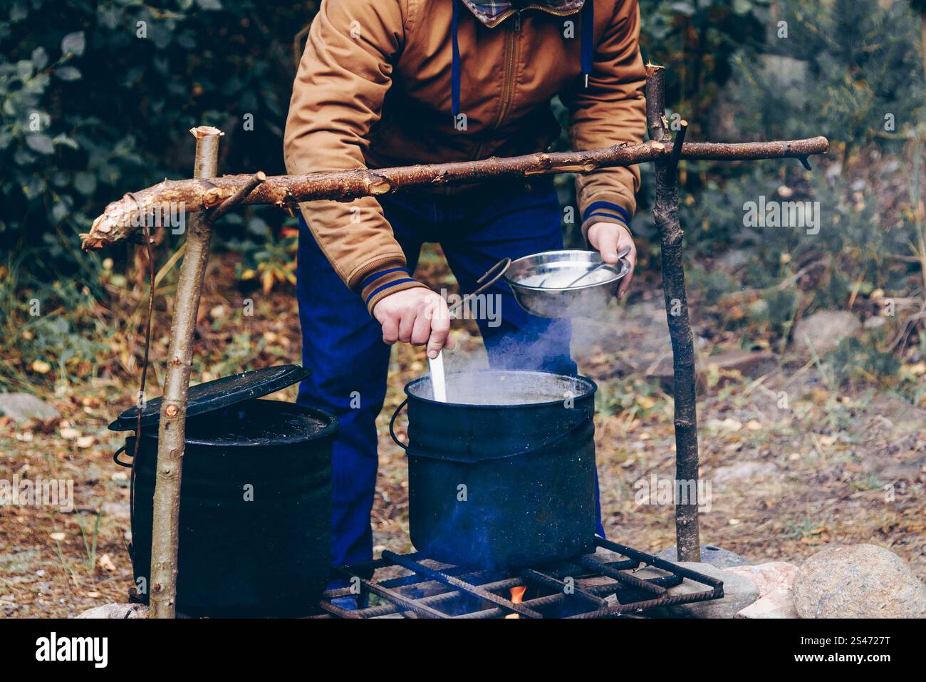 Camping Camp Kitchen, Travelers Cooking Food in Pots on a Campfire ...