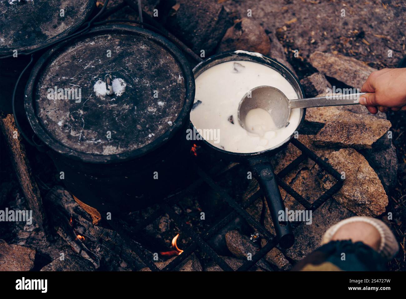 Camping Camp Kitchen, Travelers Cooking Food in Pots on a Campfire ...