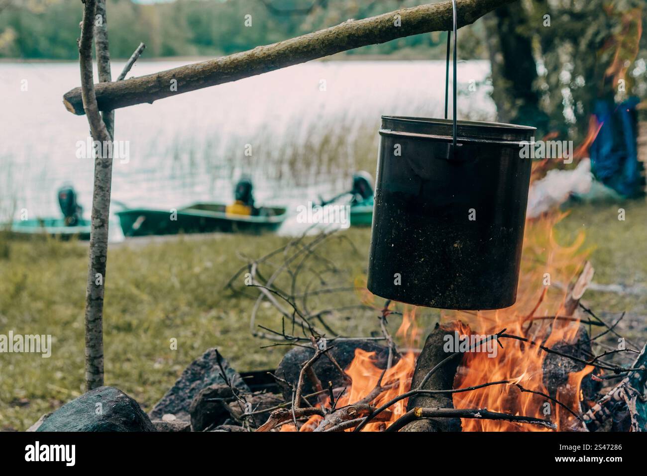 Camping Camp Kitchen, Travelers Cooking Food in Pots on a Campfire ...