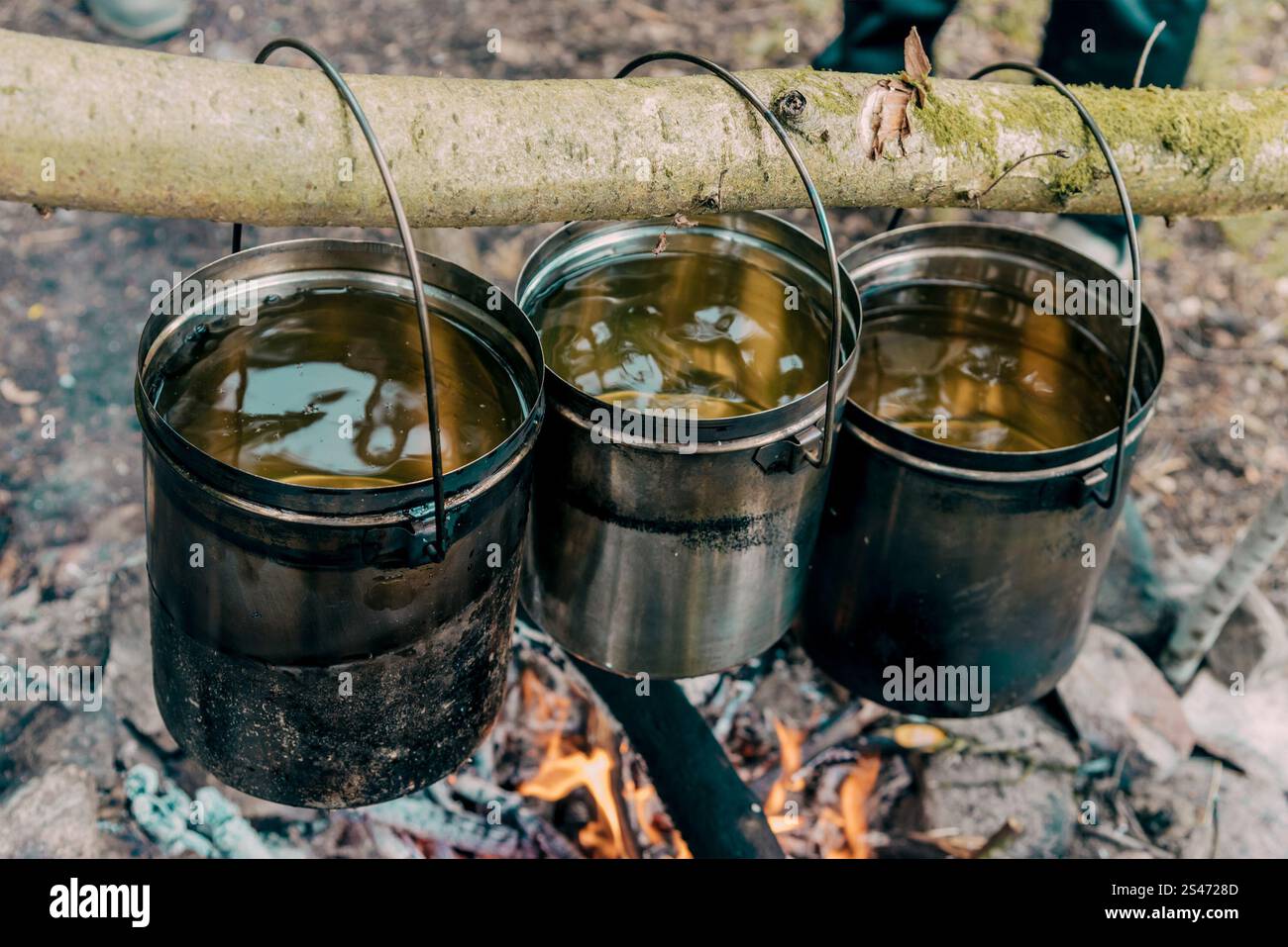 Camping Camp Kitchen, Travelers Cooking Food in Pots on a Campfire ...