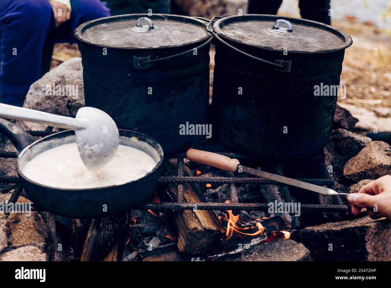 Camping Camp Kitchen, Travelers Cooking Food in Pots on a Campfire ...