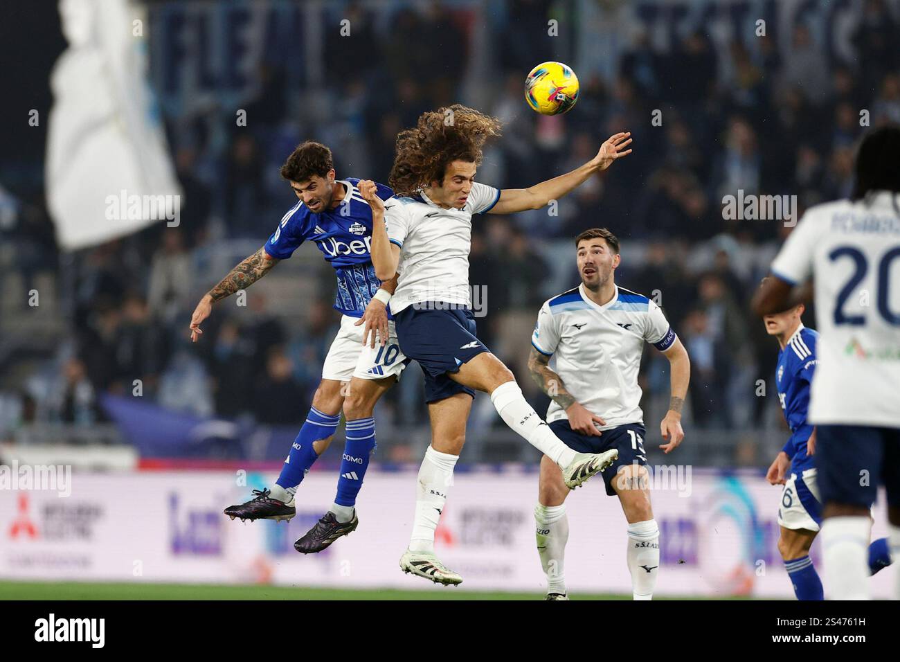 Rome, Lazio, Italy. 10th Jan, 2025. Lazio's Matteo Guendozi and Como's Patrick Cutrone during ...