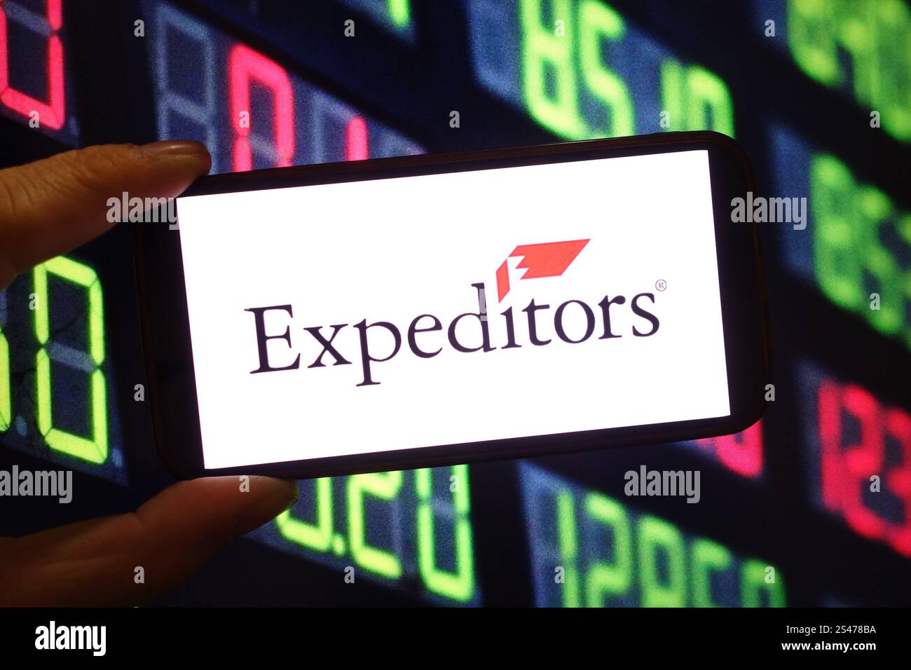 In this photo illustration, the Expeditors company logo is seen ...