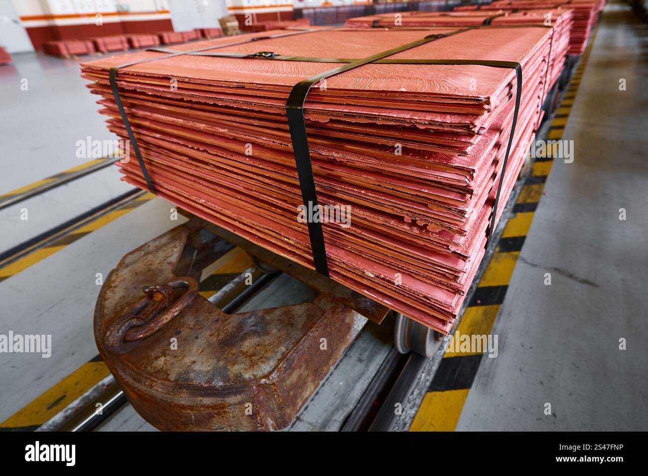 Cathode copper sheets on rail carriages in warehouse Stock Photo - Alamy