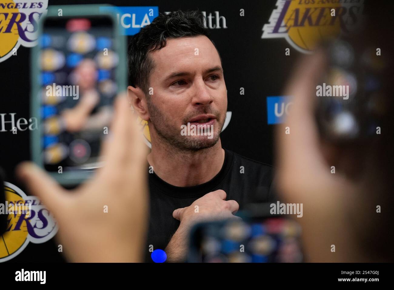 Los Angeles Lakersc coach JJ Redick speaks about the Pacific Palisades ...