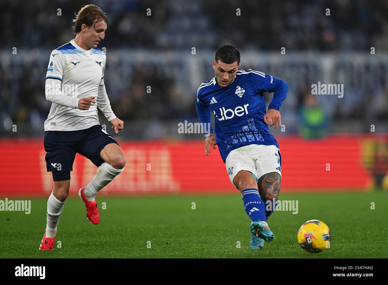 Rome, Italy. 10th Jan, 2025. Nicolo Rovella of S.S. Lazio and Gabriel Strefezza of Como 1907 in ...