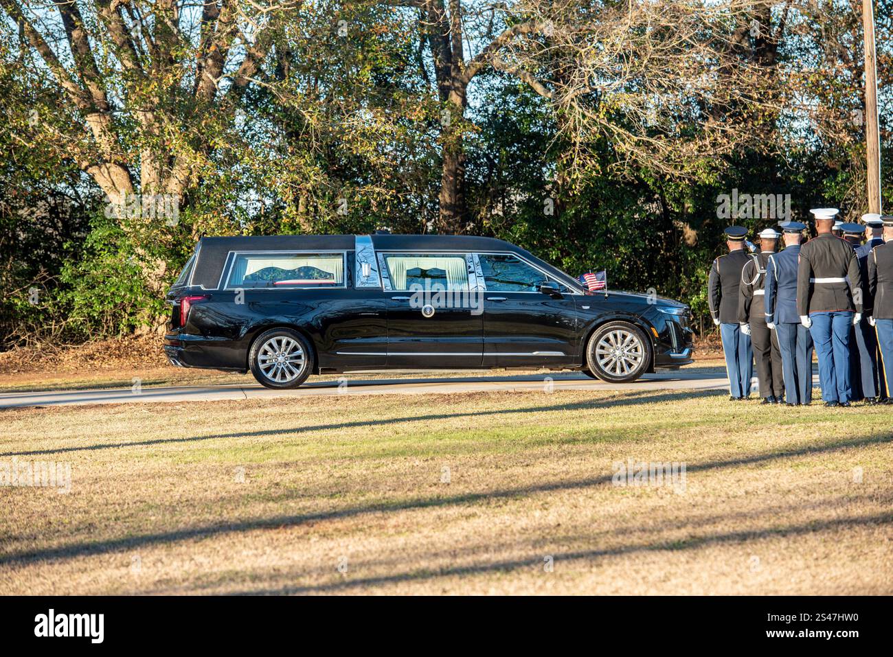 Motorcade hearse carrying former United States President Jimmy Carter ...