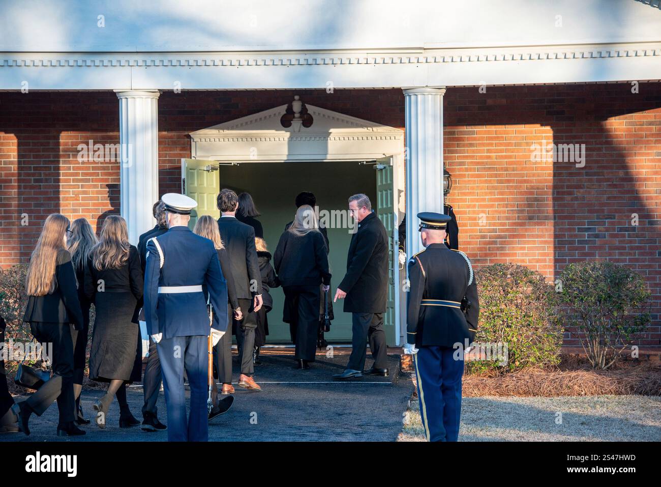 Guests arrive for a private funeral and ceremonial military service ...