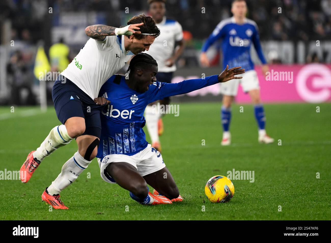 Rome, Italy. 10th Jan, 2025. Luca Pellegrini of SS Lazio and Assane Diao of Como during the ...