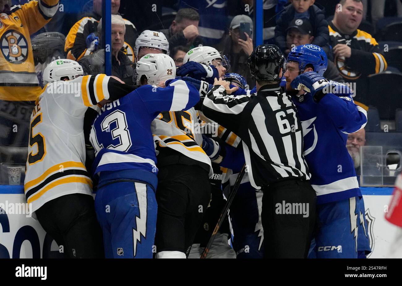 Boston Bruins and Tampa Bay Lightning fight during the third period of ...