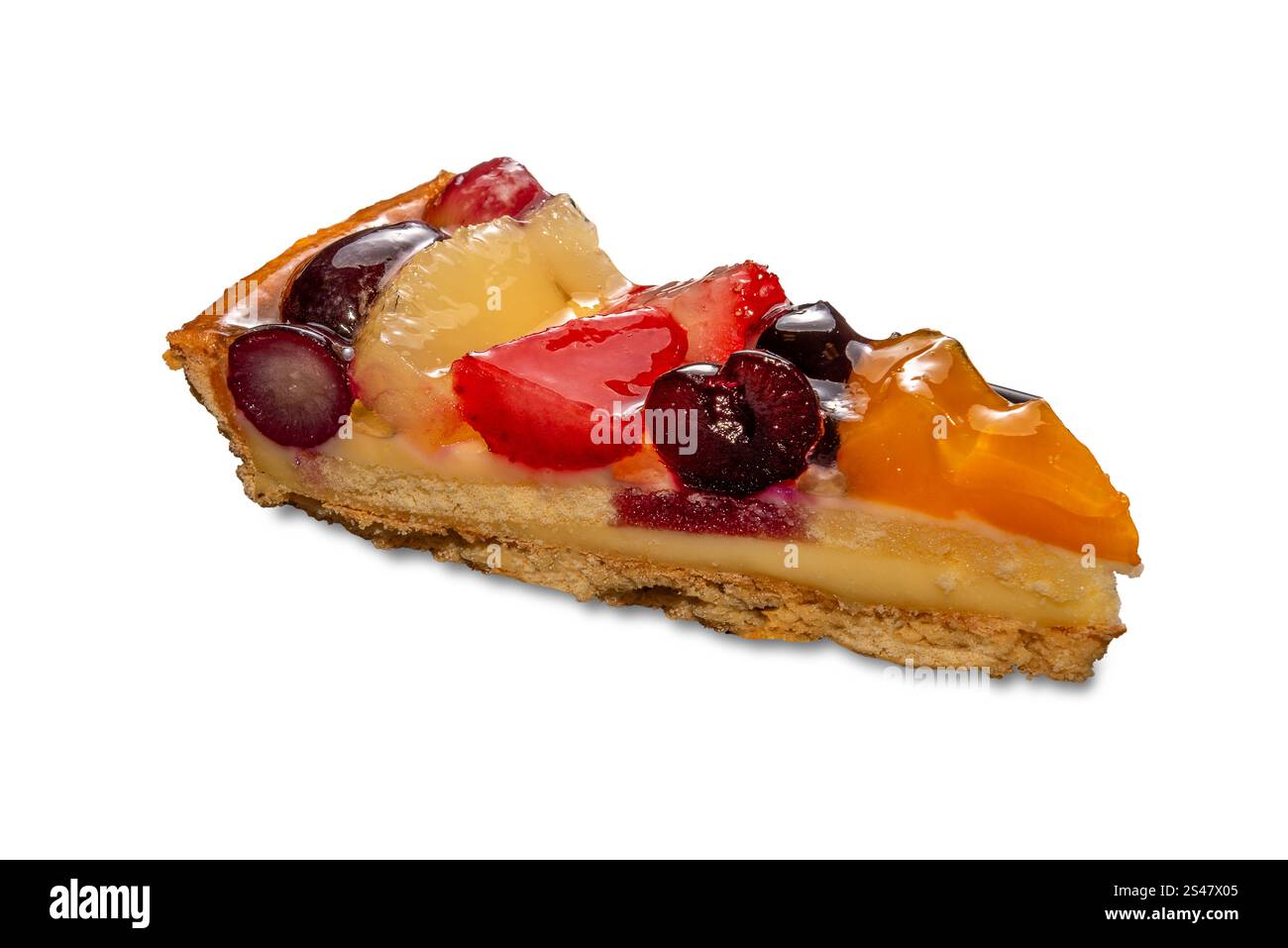 Slice of cheesecake covered with pieces of fresh and candied fruit ...
