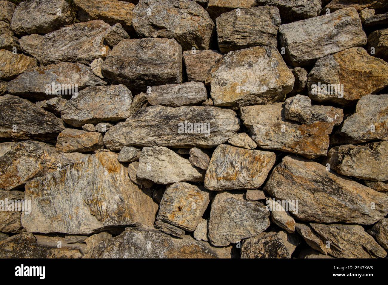 Stones texture of a medieval castle wall. Dry stone pattern of an ...