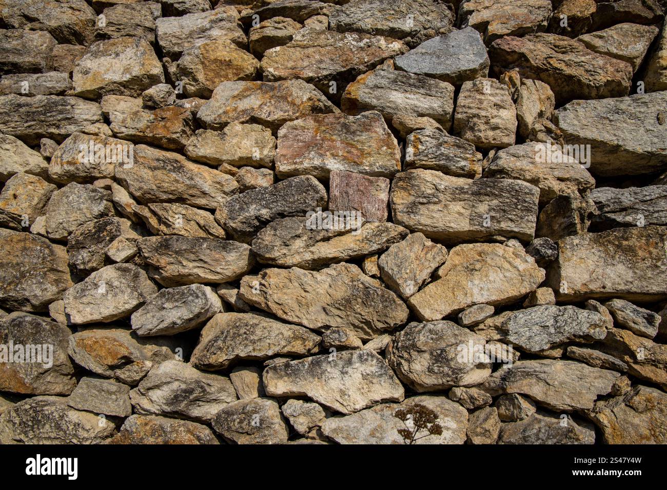 Stones texture of a medieval castle wall. Dry stone pattern of an ...