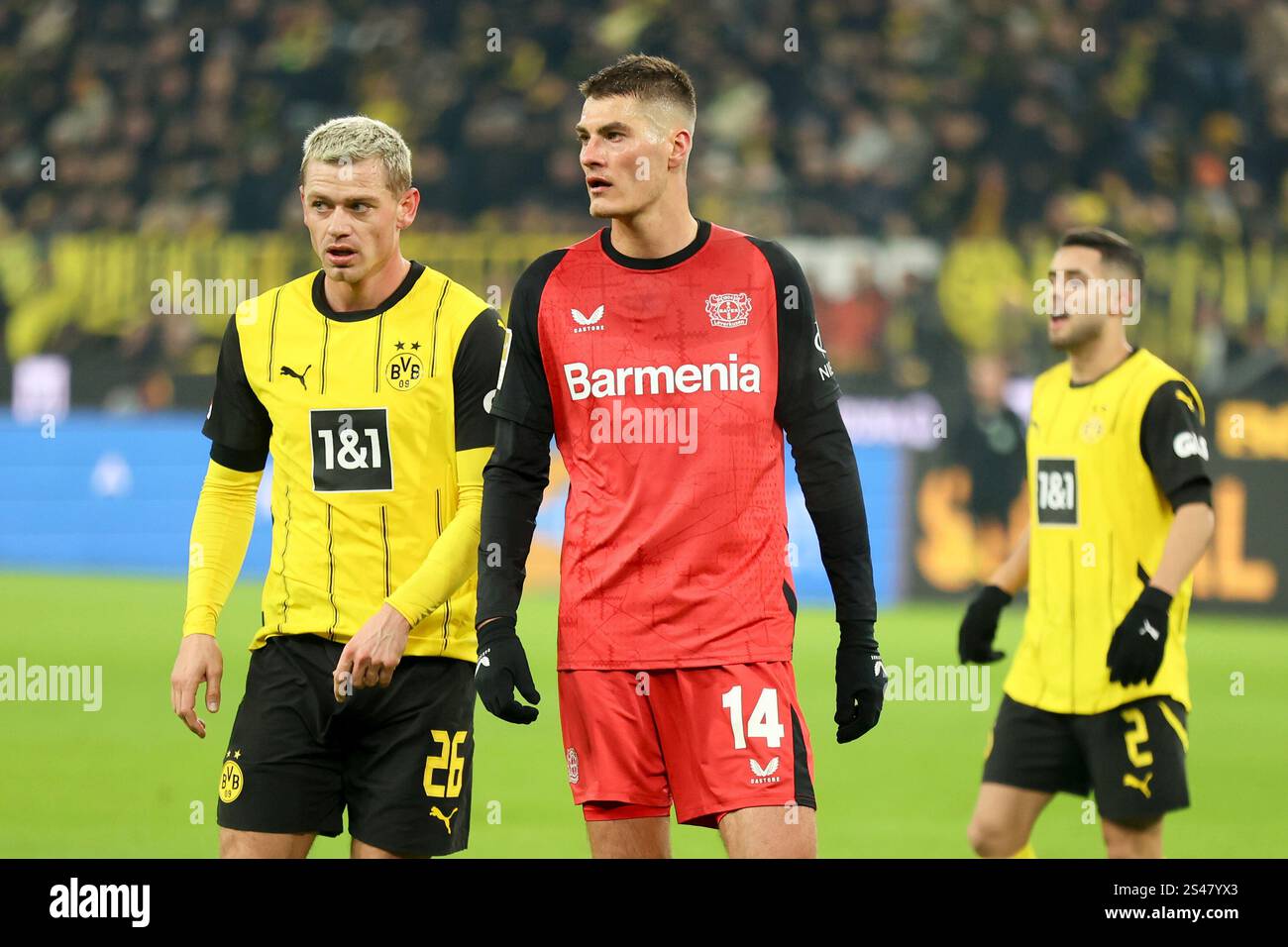 Dortmund, Deutschland. 10th Jan, 2025. Patrik Schick (Bayer 04 Leverkusen, #14) und Julian ...
