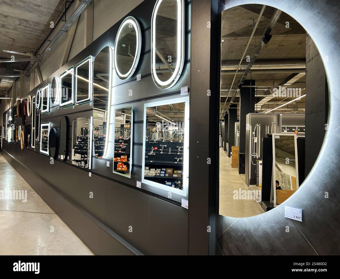Kyiv, Ukraine - January 10, 2025: Contemporary showroom showcasing a wide range of mirrors with ...
