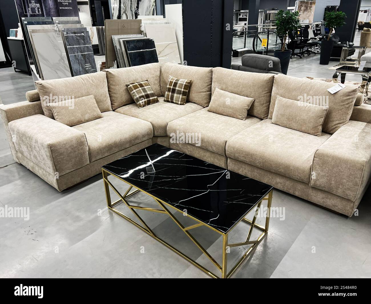 Kyiv, Ukraine - January 10, 2025: Elegant beige L-shaped sectional sofa ...