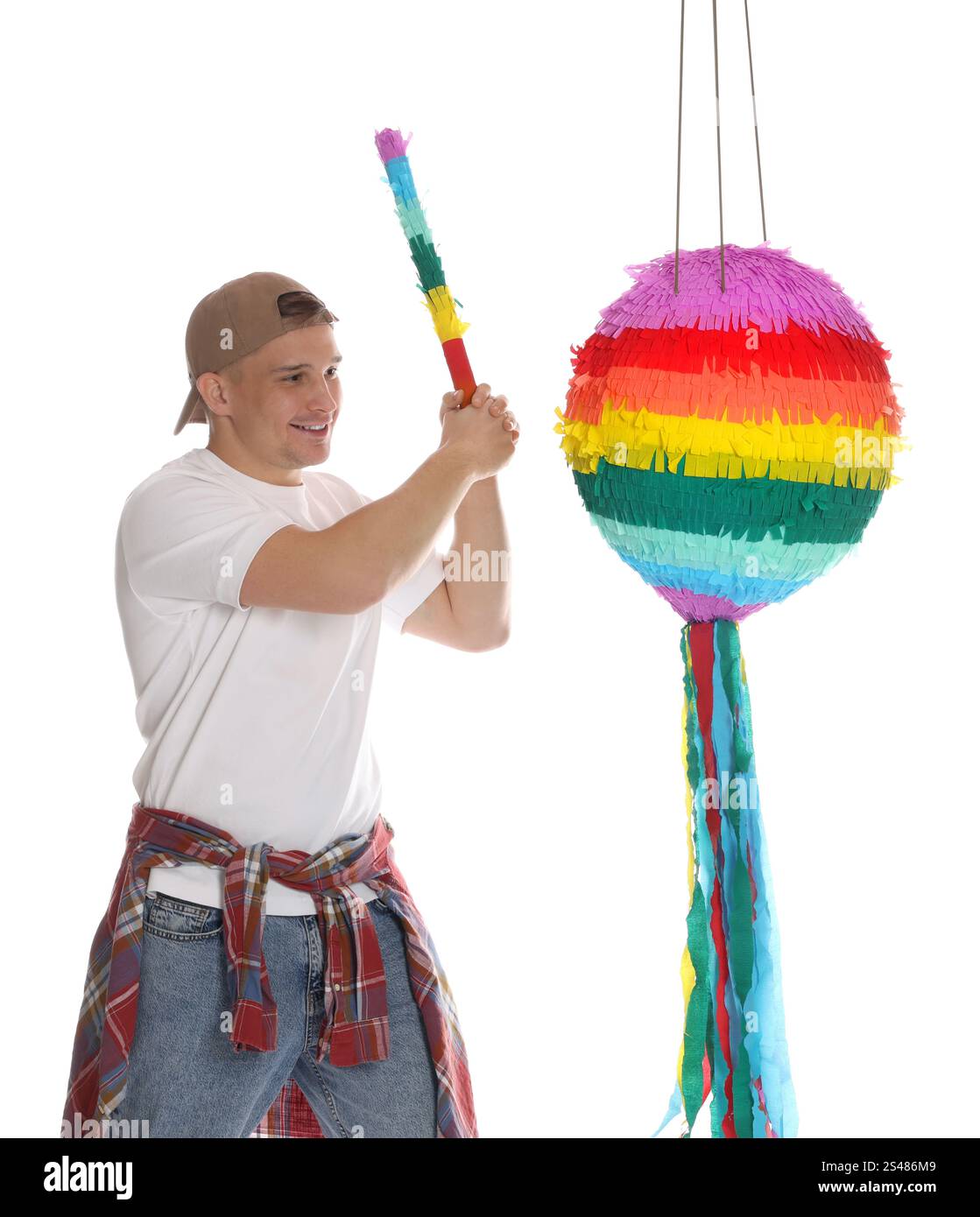 Happy man breaking pinata on white background Stock Photo - Alamy