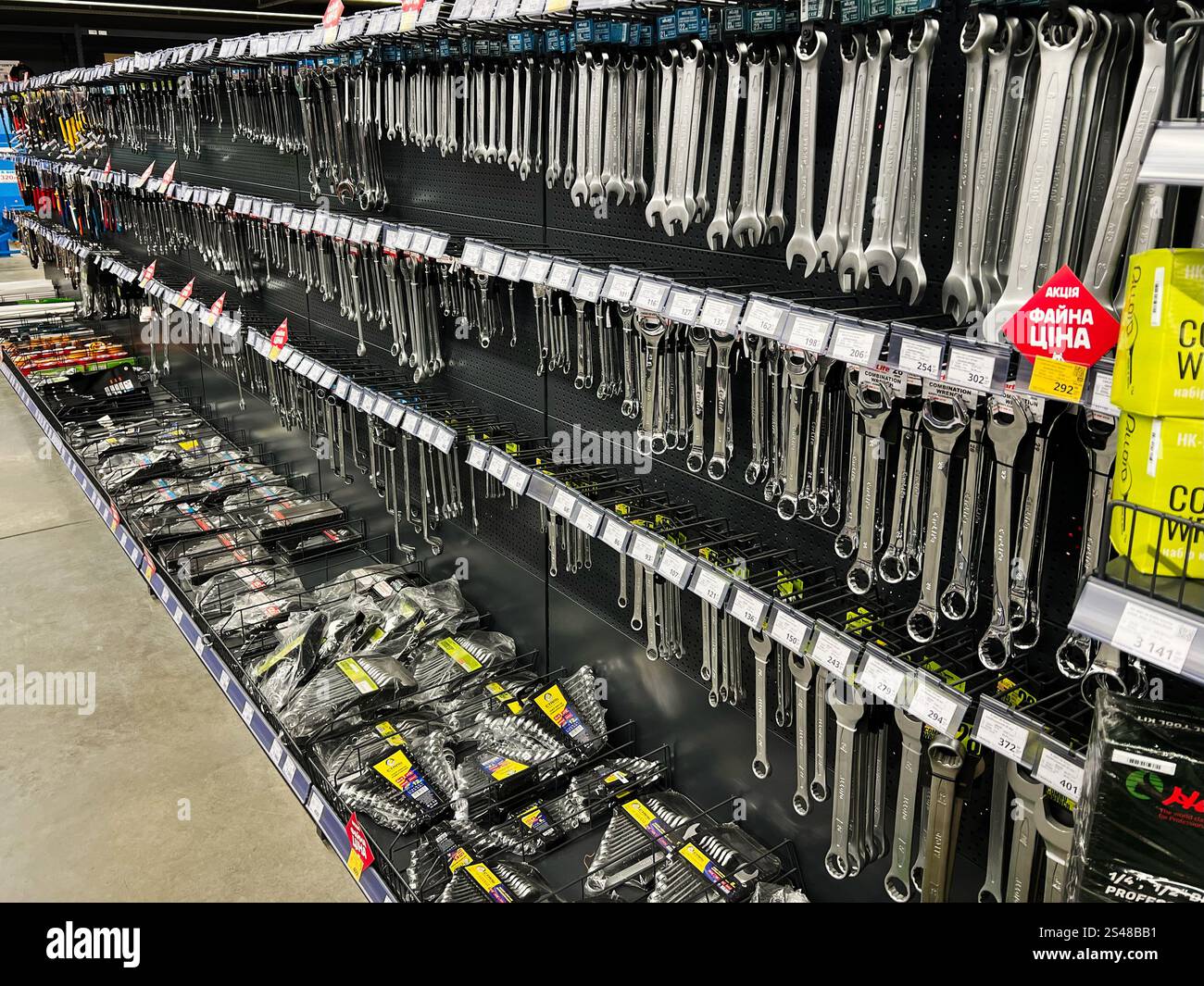 Kyiv, Ukraine - January 10, 2025: Rows of wrenches and hand tools ...