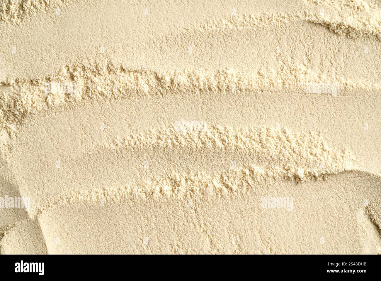 Whey protein powder as textured background. Healthy nutritional ...