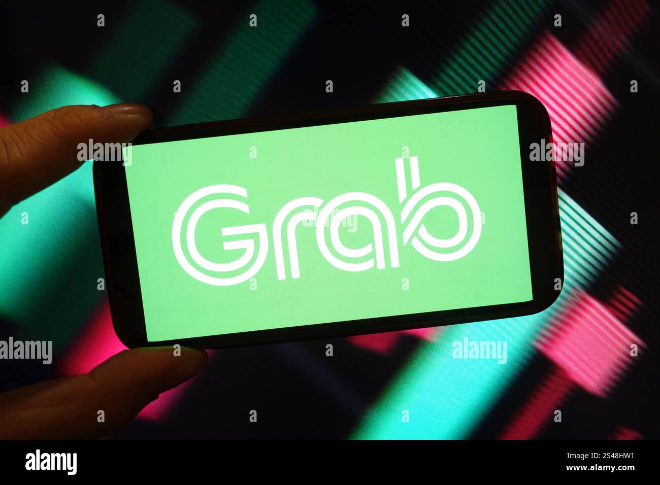 Poland. 09th Jan, 2025. In this photo illustration, the Grab Holdings ...