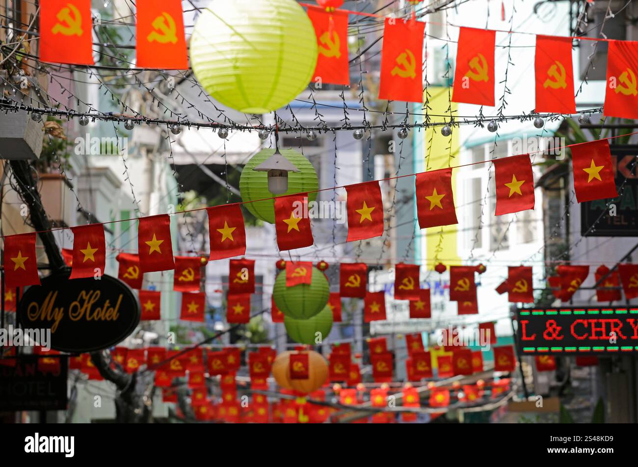 Ho Chi Minh City, Vietnam - January 1, 2023: Vietnamese and red hammer ...