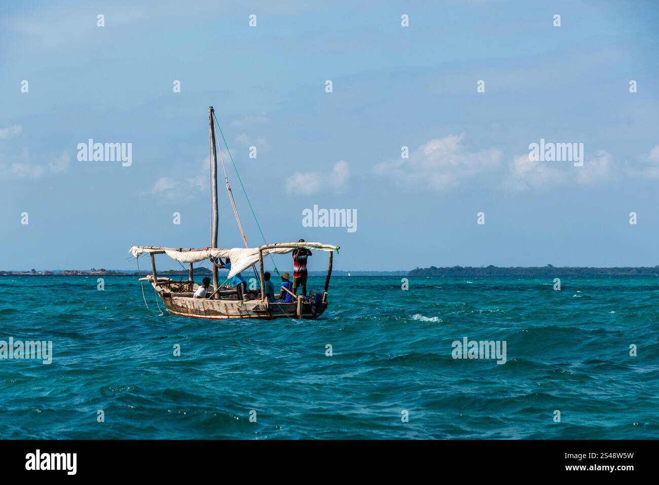 Zanzibar, Tanzania - August 6, 2024. A Dhow, a traditional wooden boats ...