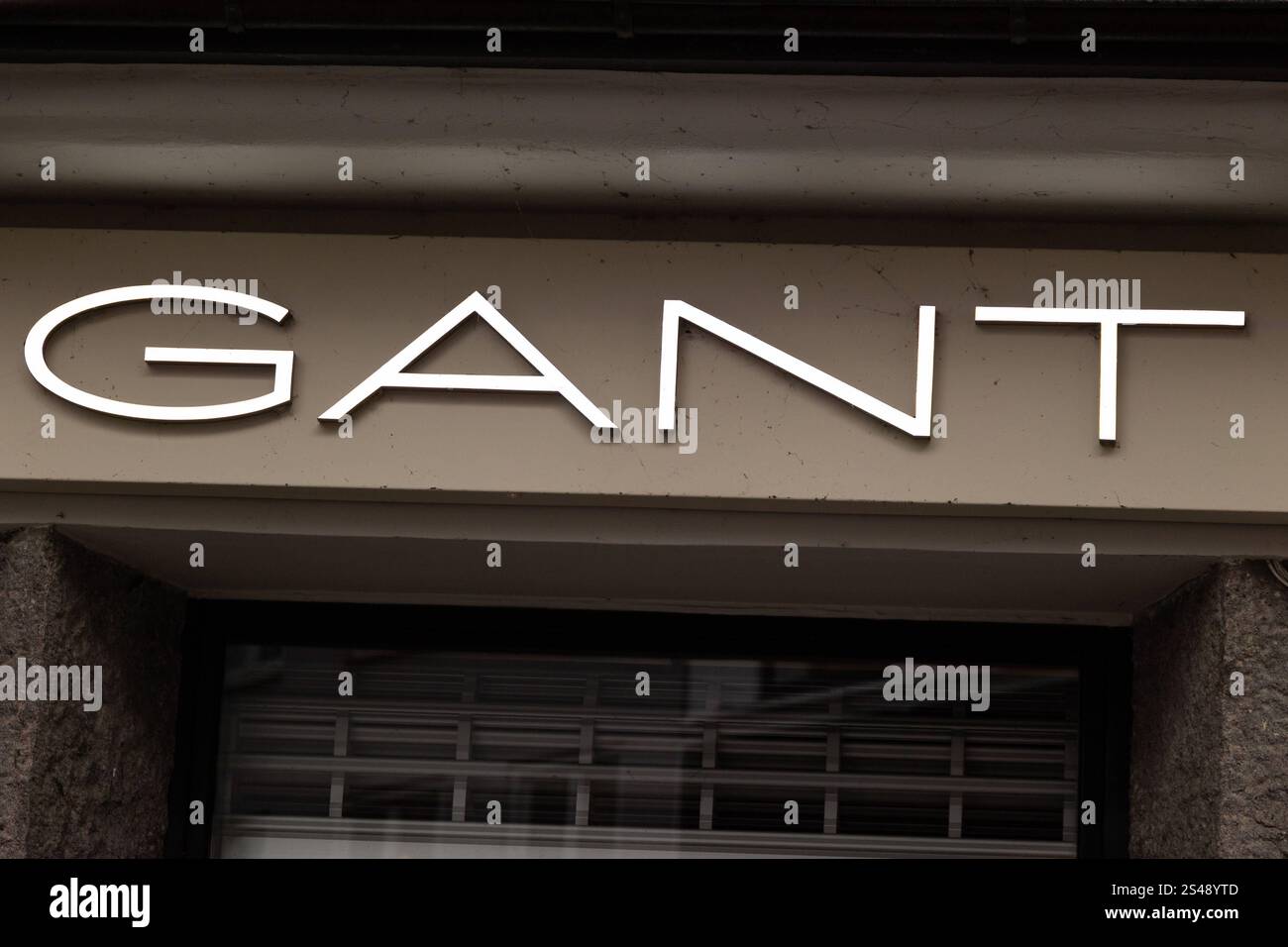 The logo of American Swedish clothing brand Gant is seen at the outside ...