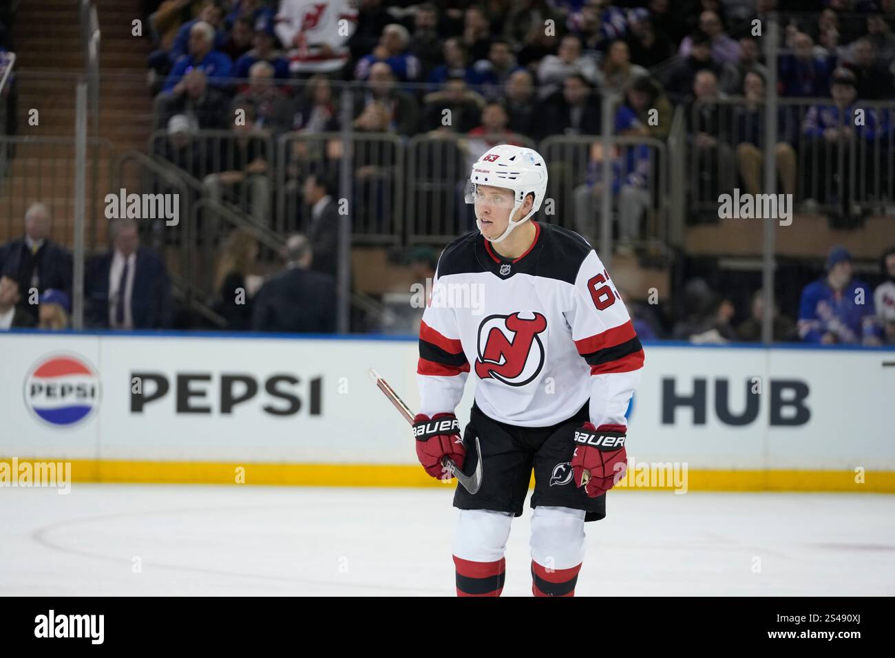 New Jersey Devils' Jesper Bratt (63) skates toward his bench after ...
