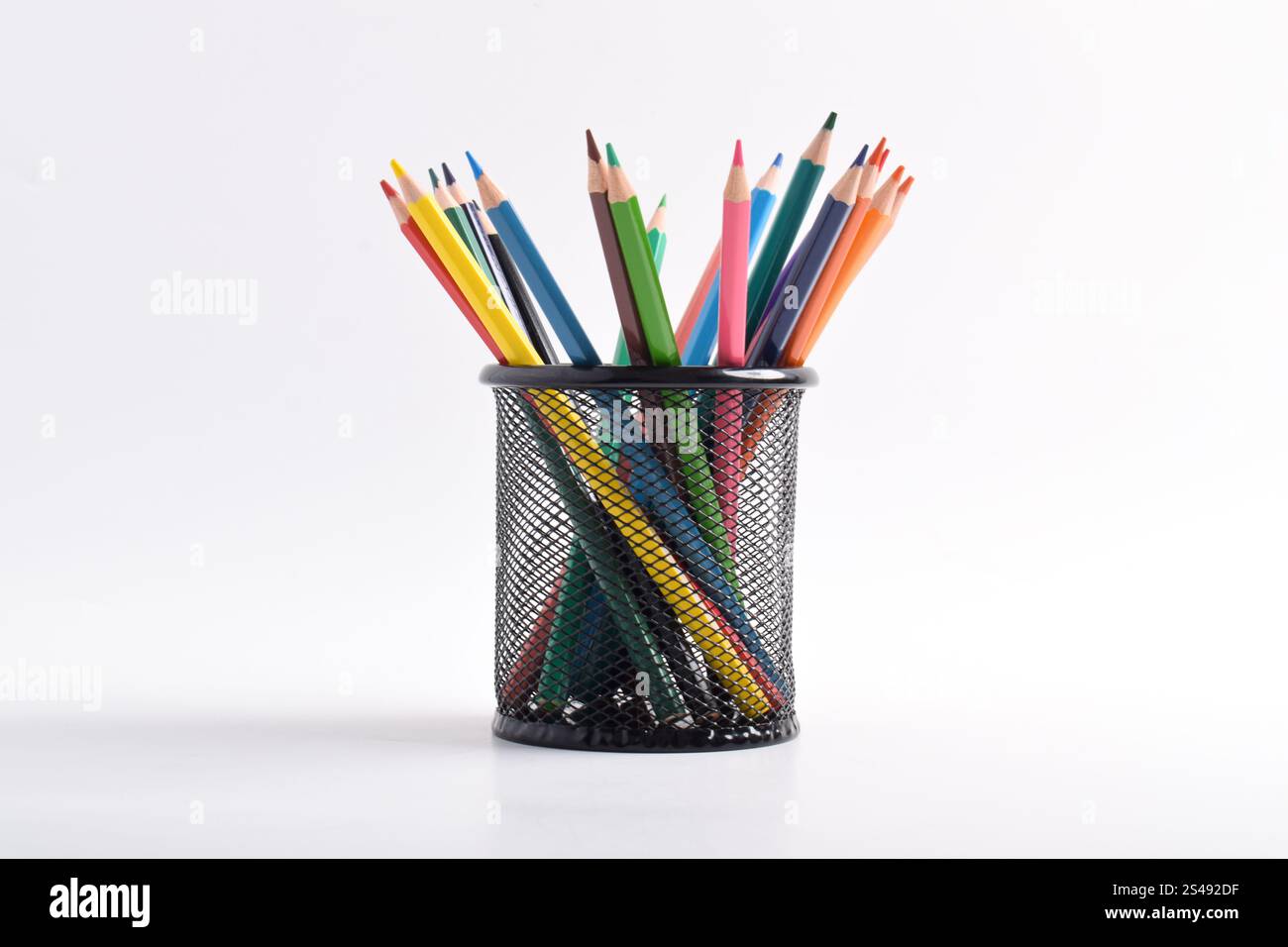 Colorful pencils in metal basket isolated on white background. Colorful ...