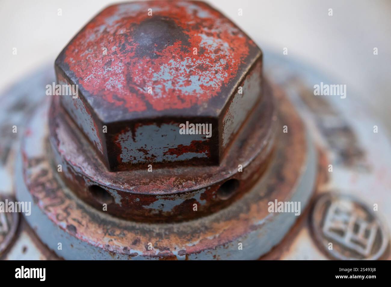 Rusted Hexagonal Fire Hydrant Cap Close-up Stock Photo - Alamy