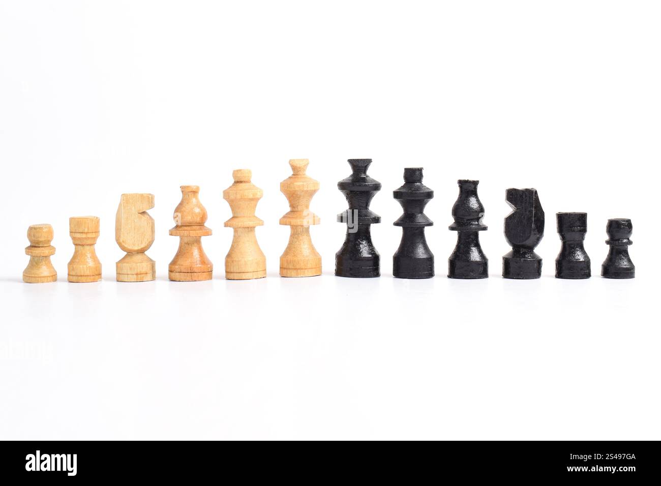 Full set of black and brown wooden chess pieces isolated on white ...
