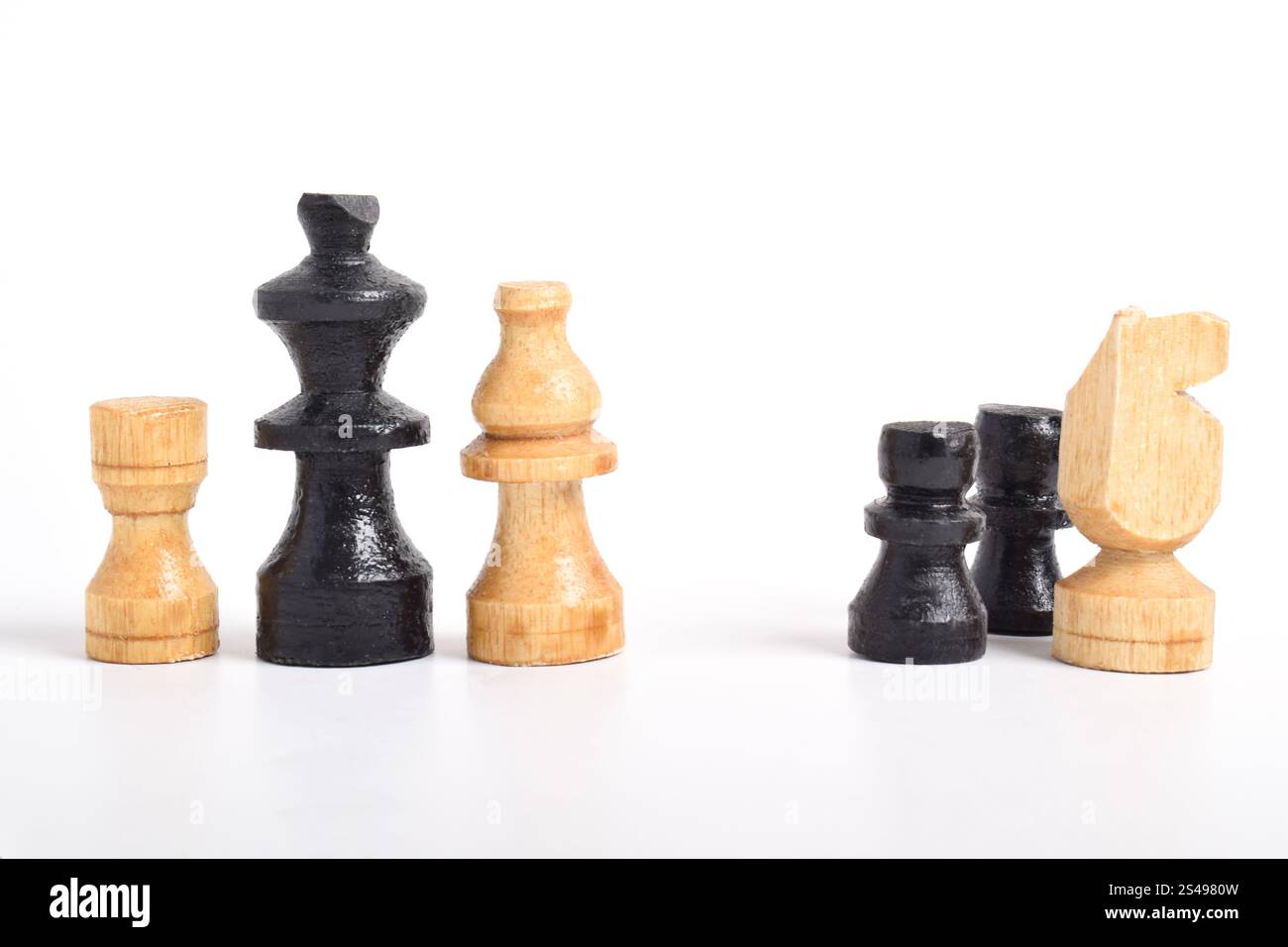 Old chess pieces isolated on white background Stock Photo - Alamy