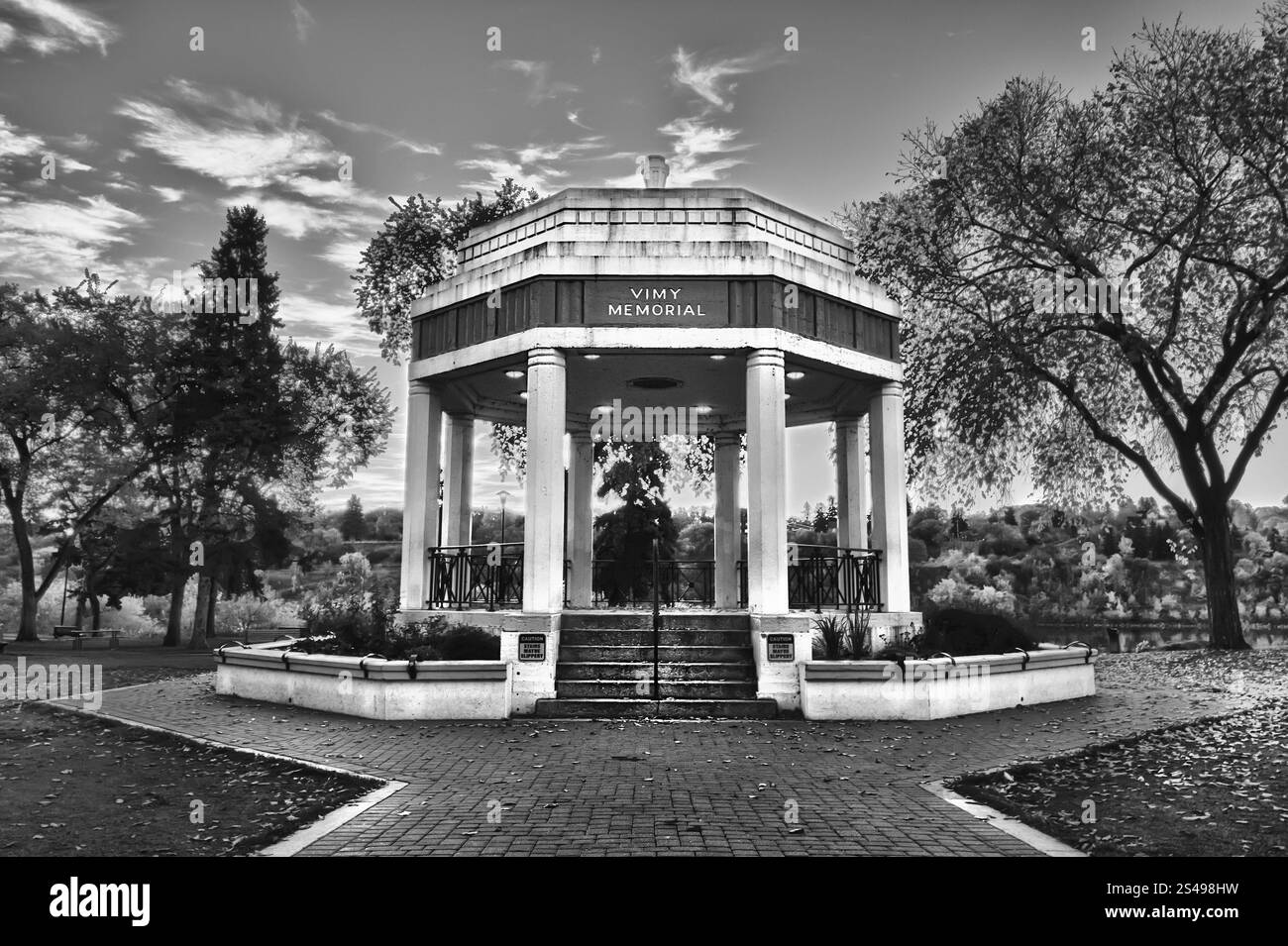A black and white photo of a pavilion with a sign that reads "The ...