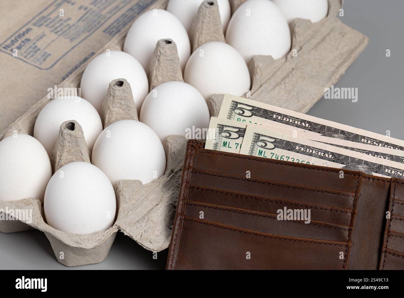 Fresh white chicken eggs in carton with cash money. Egg prices, H5N1 ...