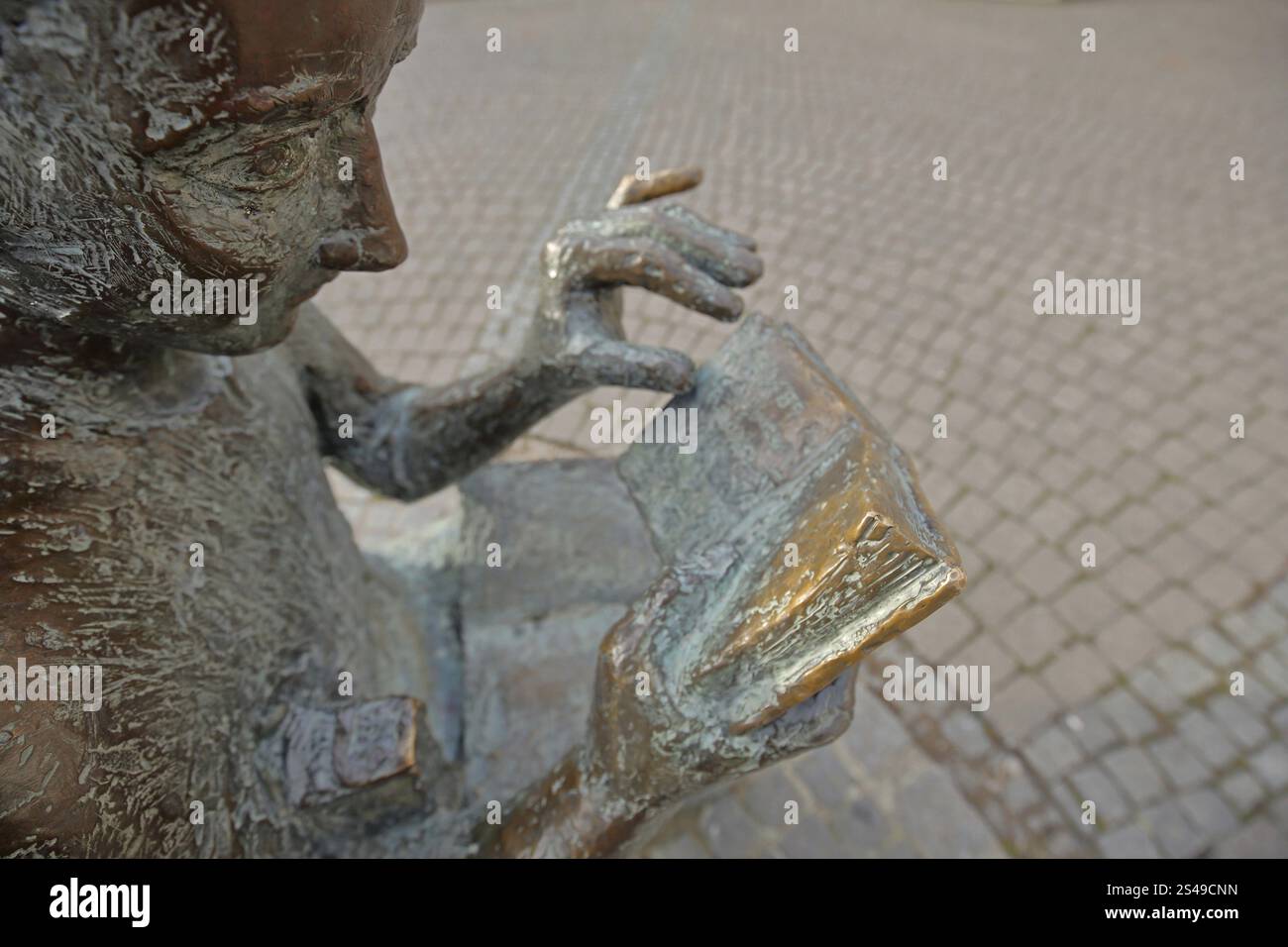 Sculpture Book reader at the fountain in front of the town library ...