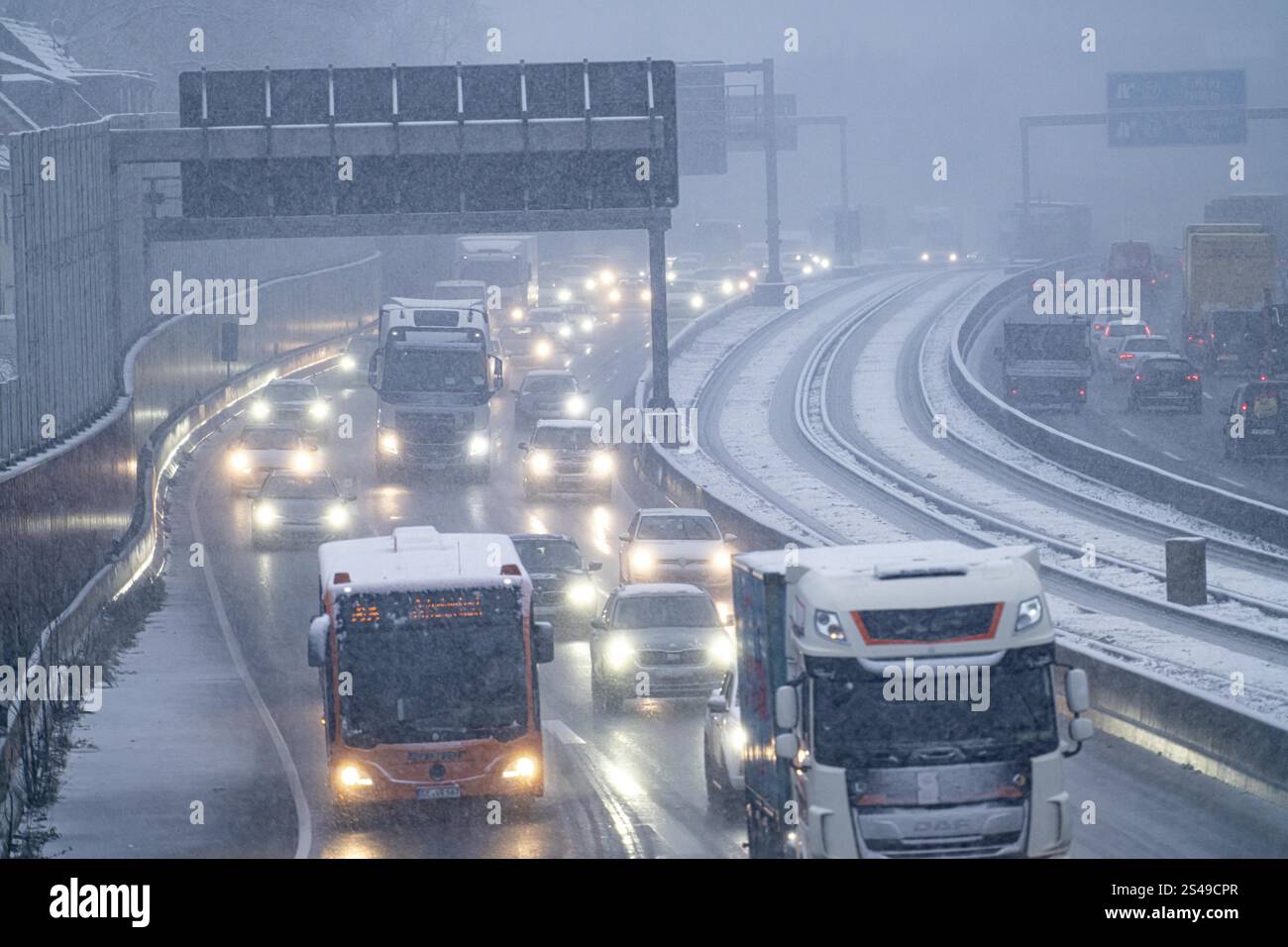 Winter weather, heavy snowfall, traffic jam on the A40 motorway in ...
