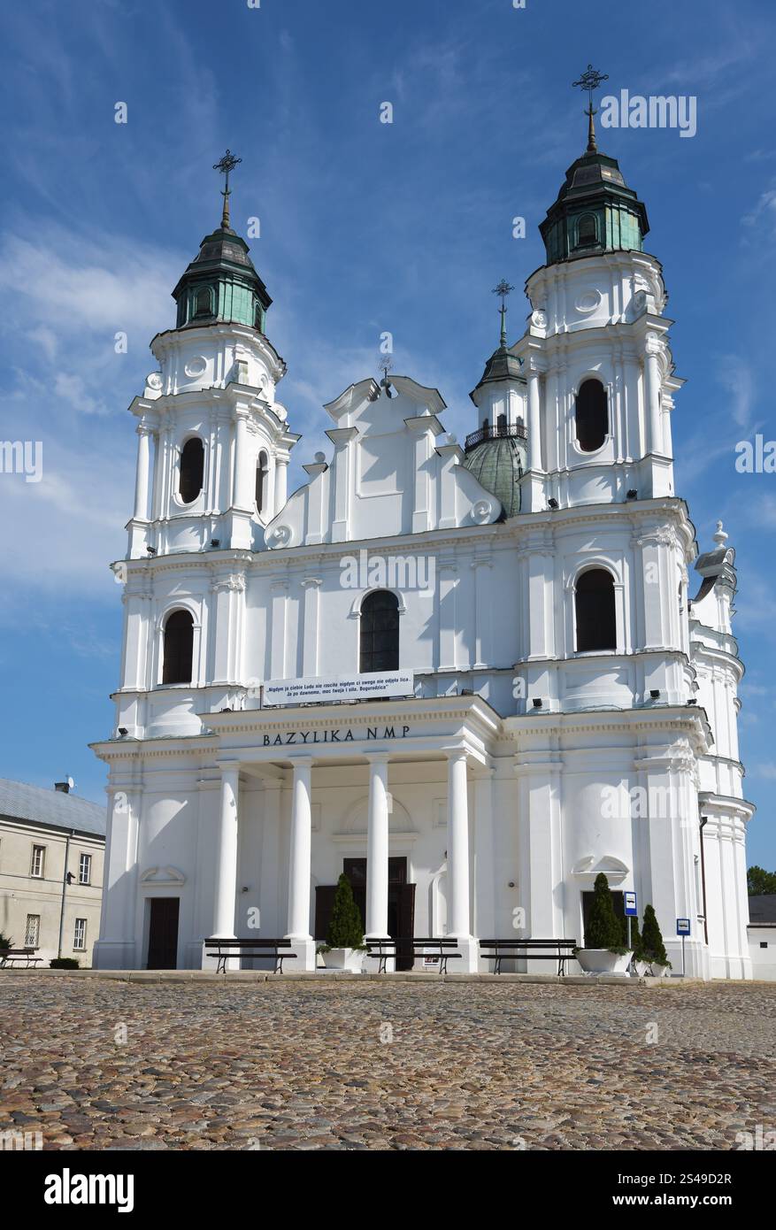 Historic baroque church with twin towers, under a clear sky, Basilica ...
