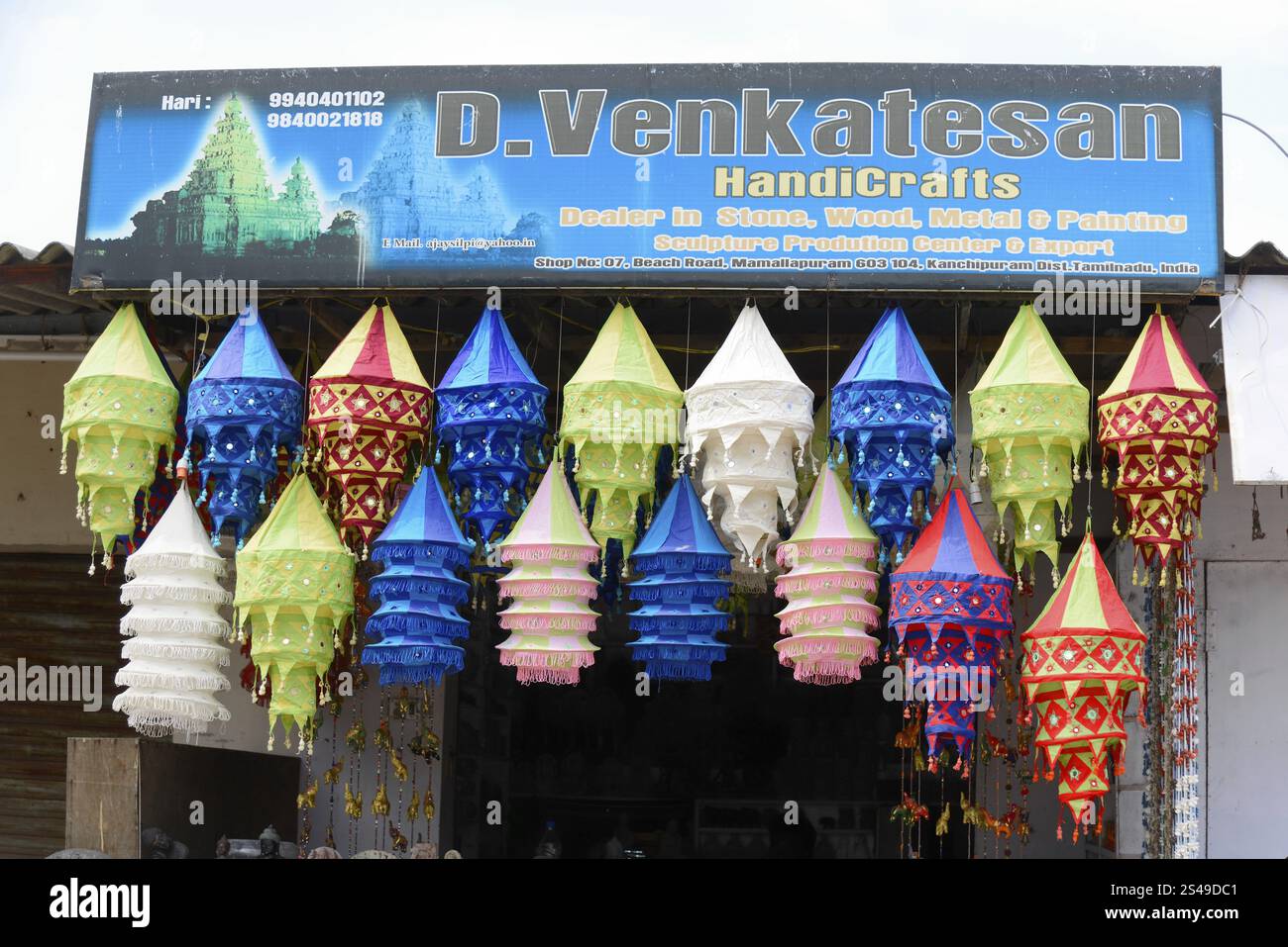 Colourful hanging handicraft lamps in front of a handicraft shop ...