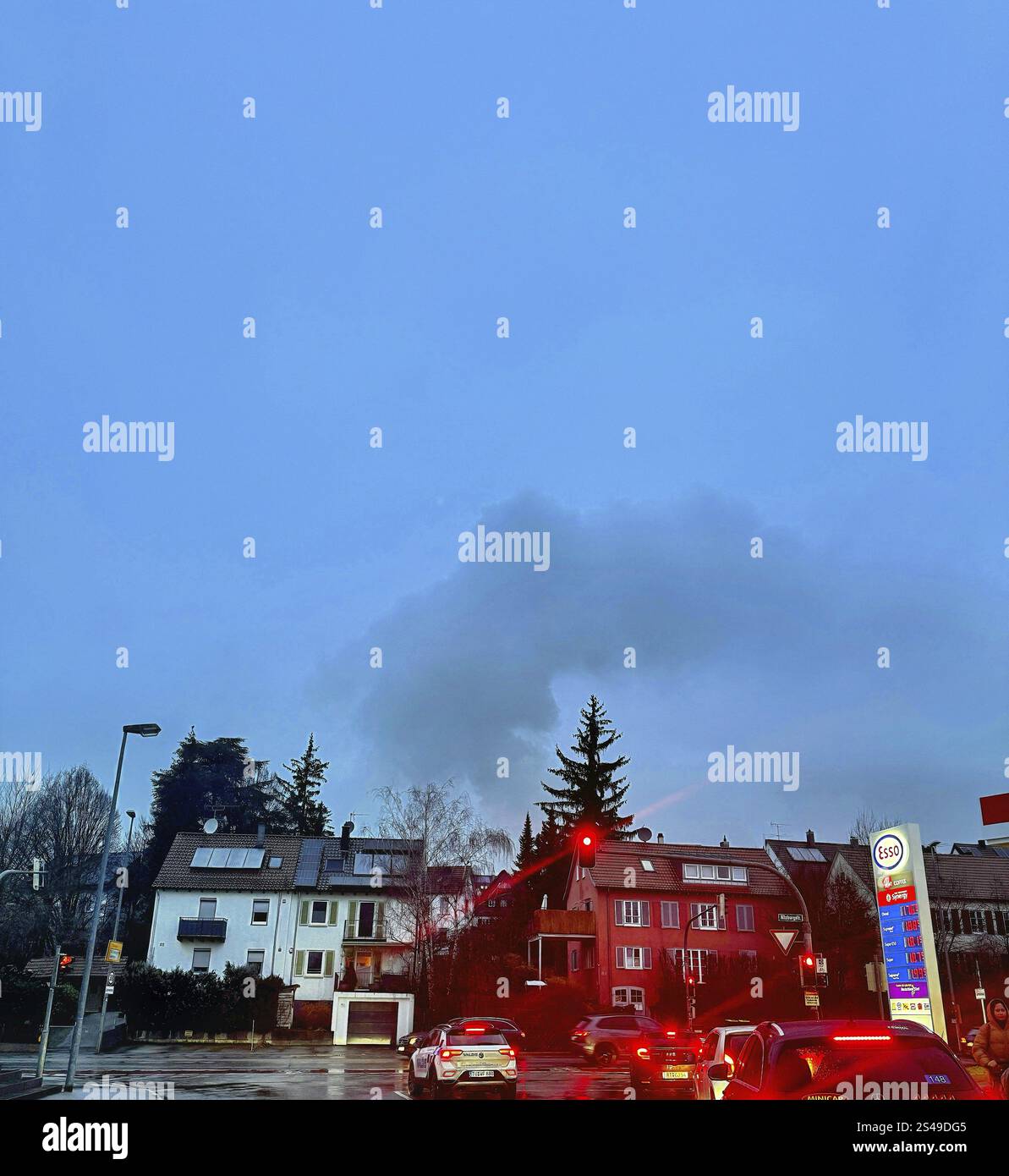 Fire, residential building on fire, cloud of smoke, fire brigade, city ...