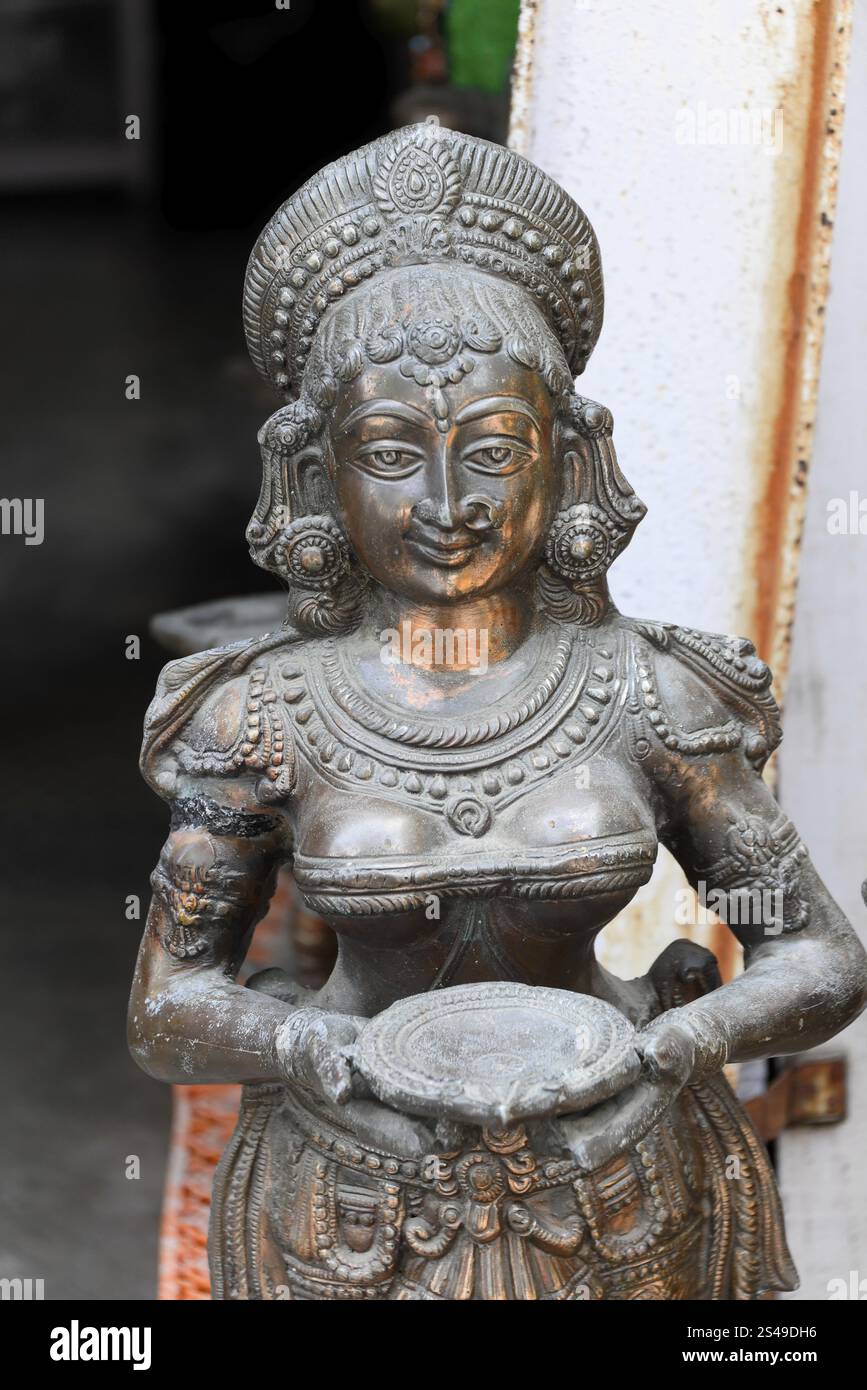 Detailed bronze sculpture of an Indian goddess with elaborately ...