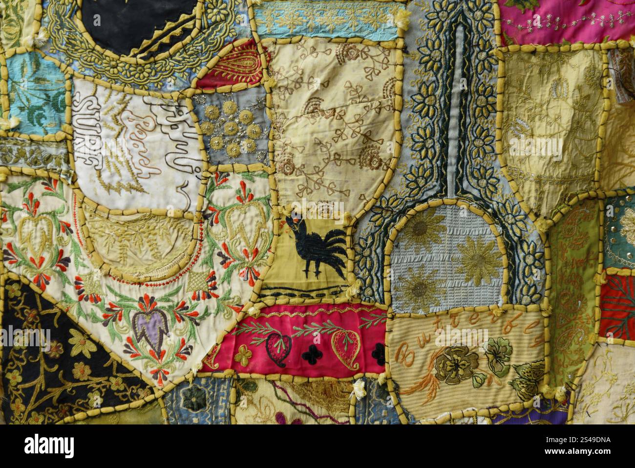 Detailed patchwork design with various patterns and colours ...