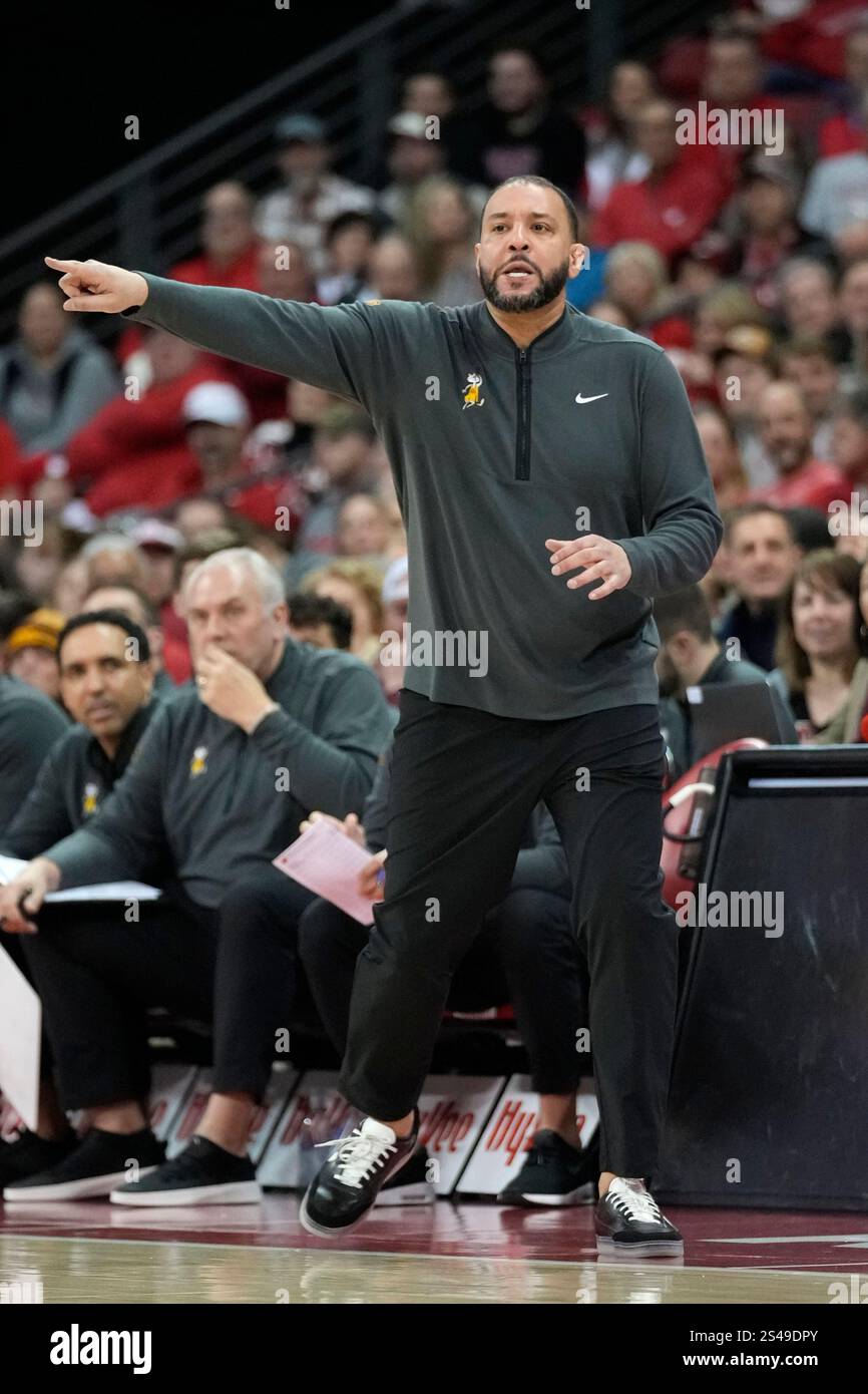 Minnesota head coach Ben Johnson, front, yells to his players during ...