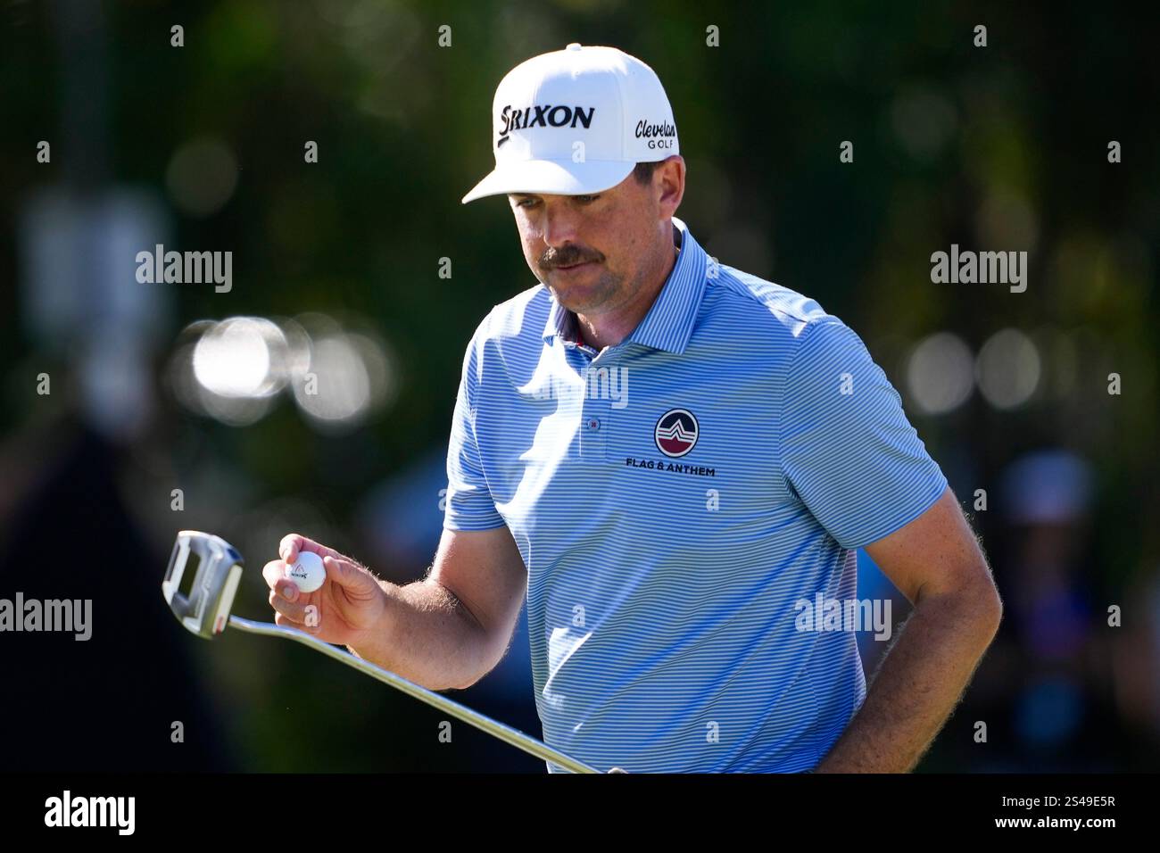 Keegan Bradley reacts after making a shot on the ninth green during the ...