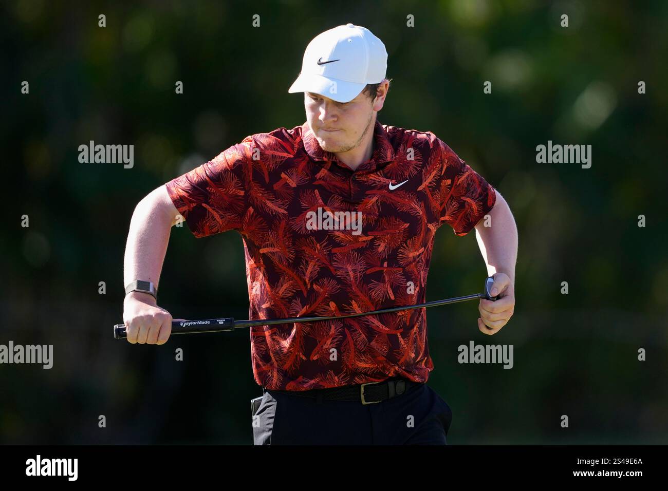Robert MacIntyre, of Scotland, reacts after missing his shot on the ...