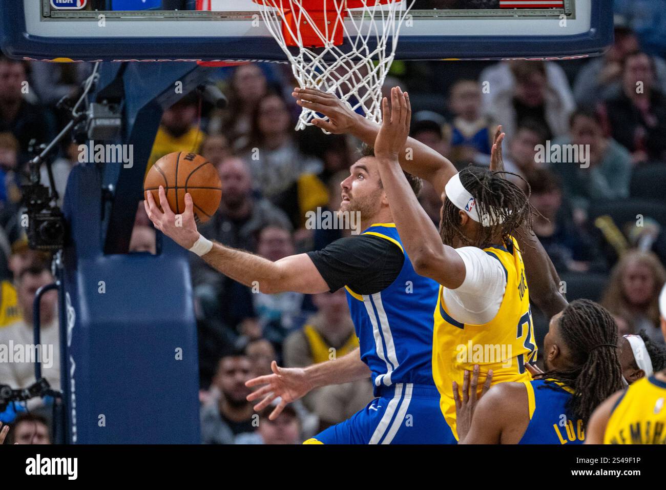 Golden State Warriors guard Pat Spencer, left, looks to shoot from ...