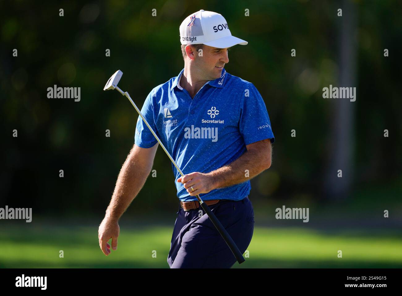 Denny McCarthy looks back at the ninth hole after missing his shot ...