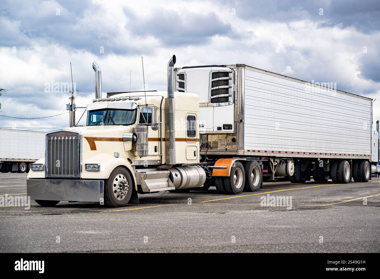 Industrial beige big rig long haul semi truck tractor with extended cab ...