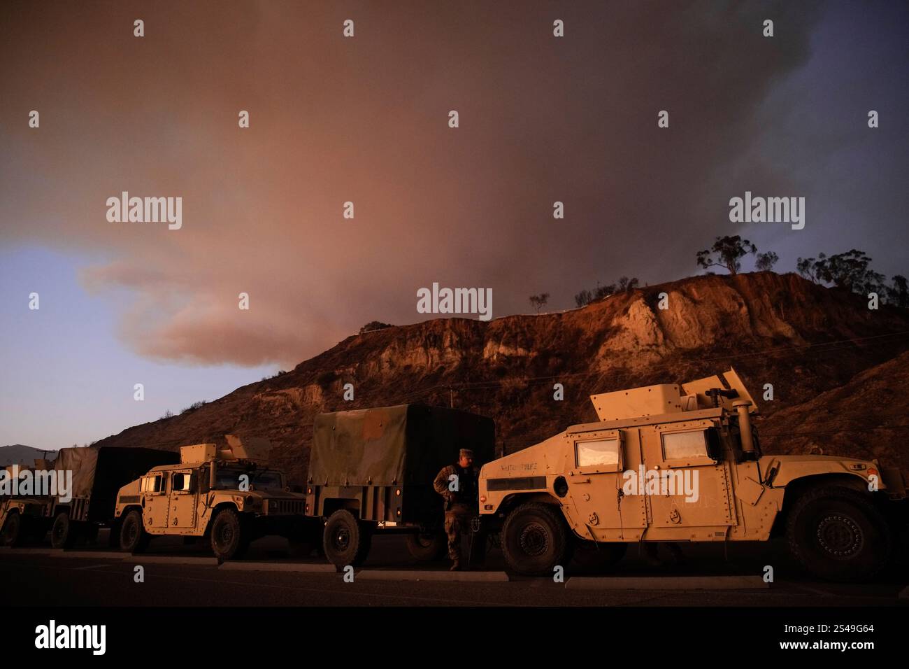 California National Guard line up along the Pacific Coast Highway as a ...